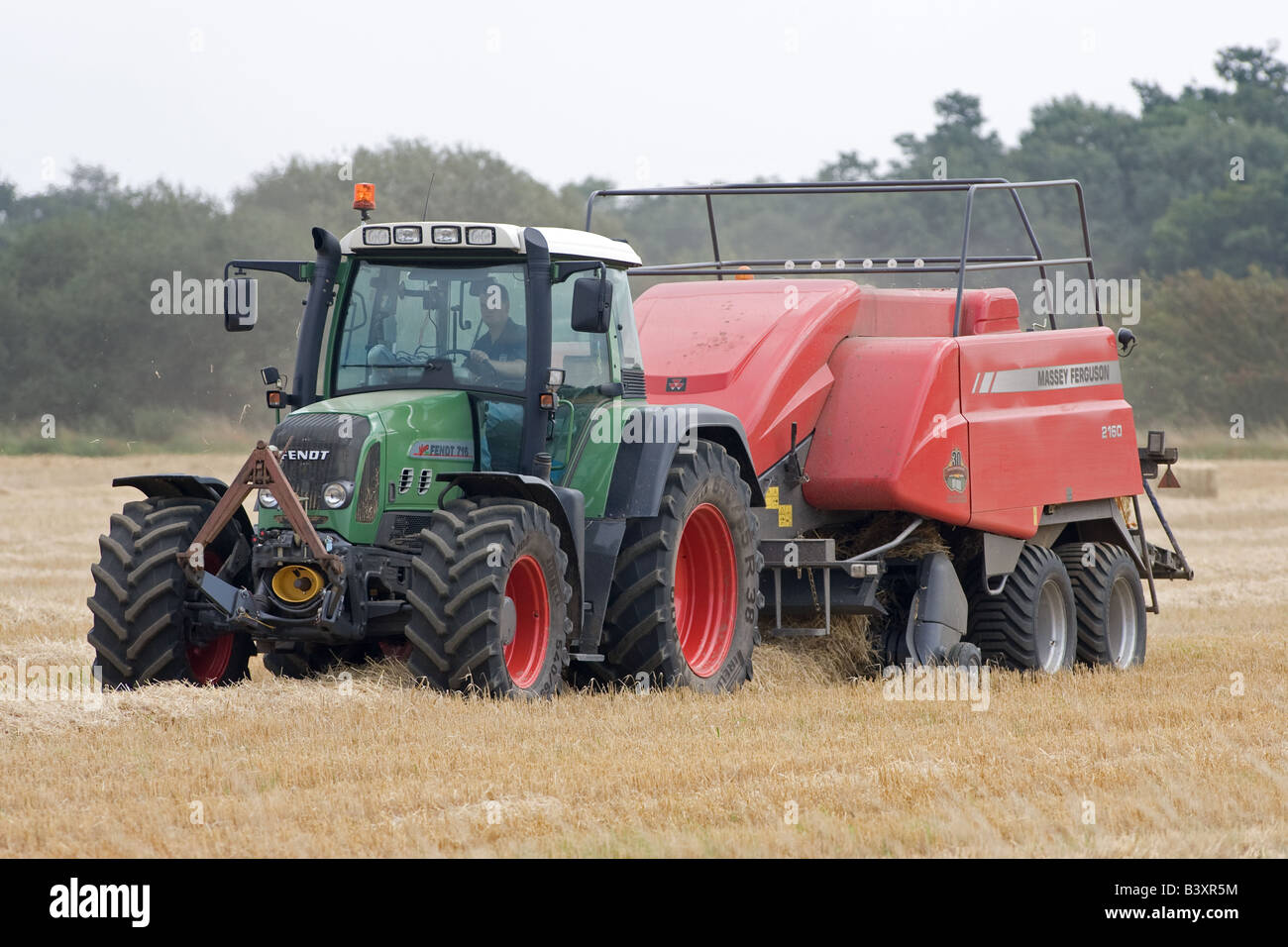 Fendt Tractor Baling With Massey Ferguson Baler Stock Photo - Alamy