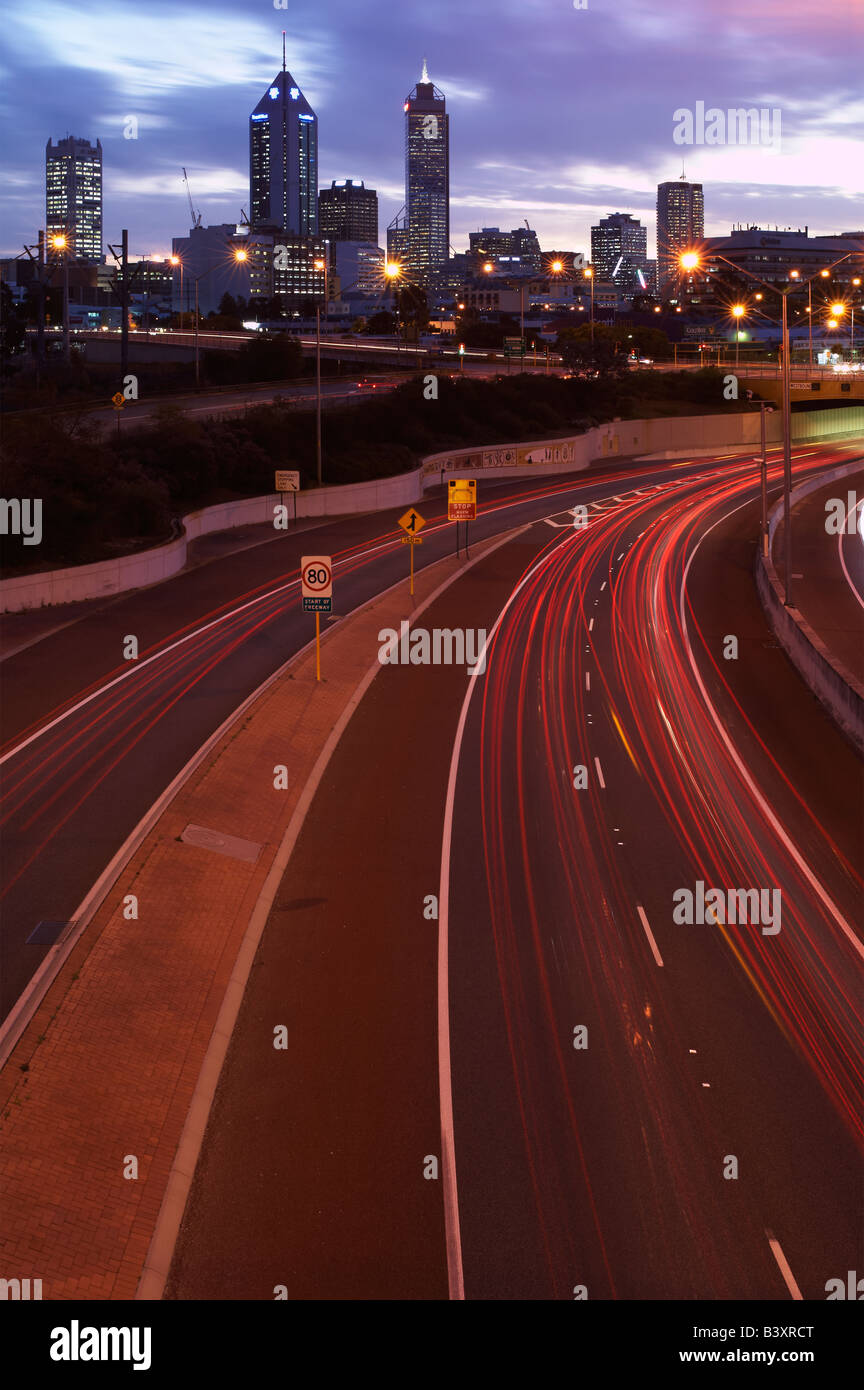 Perth city skyline at sunset Western Australia with light trails on the ...