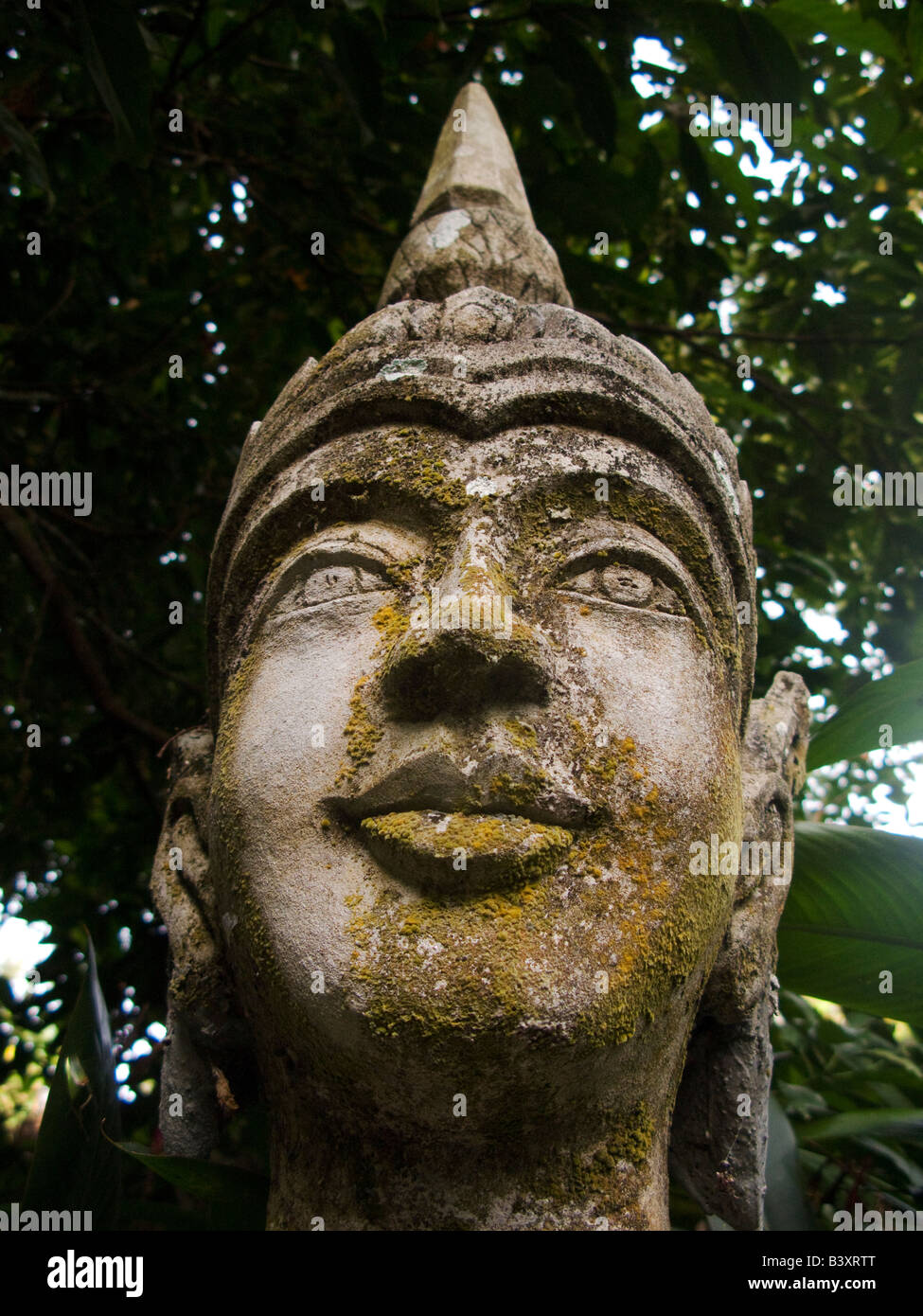 Calm face at the Magic garden Stock Photo - Alamy