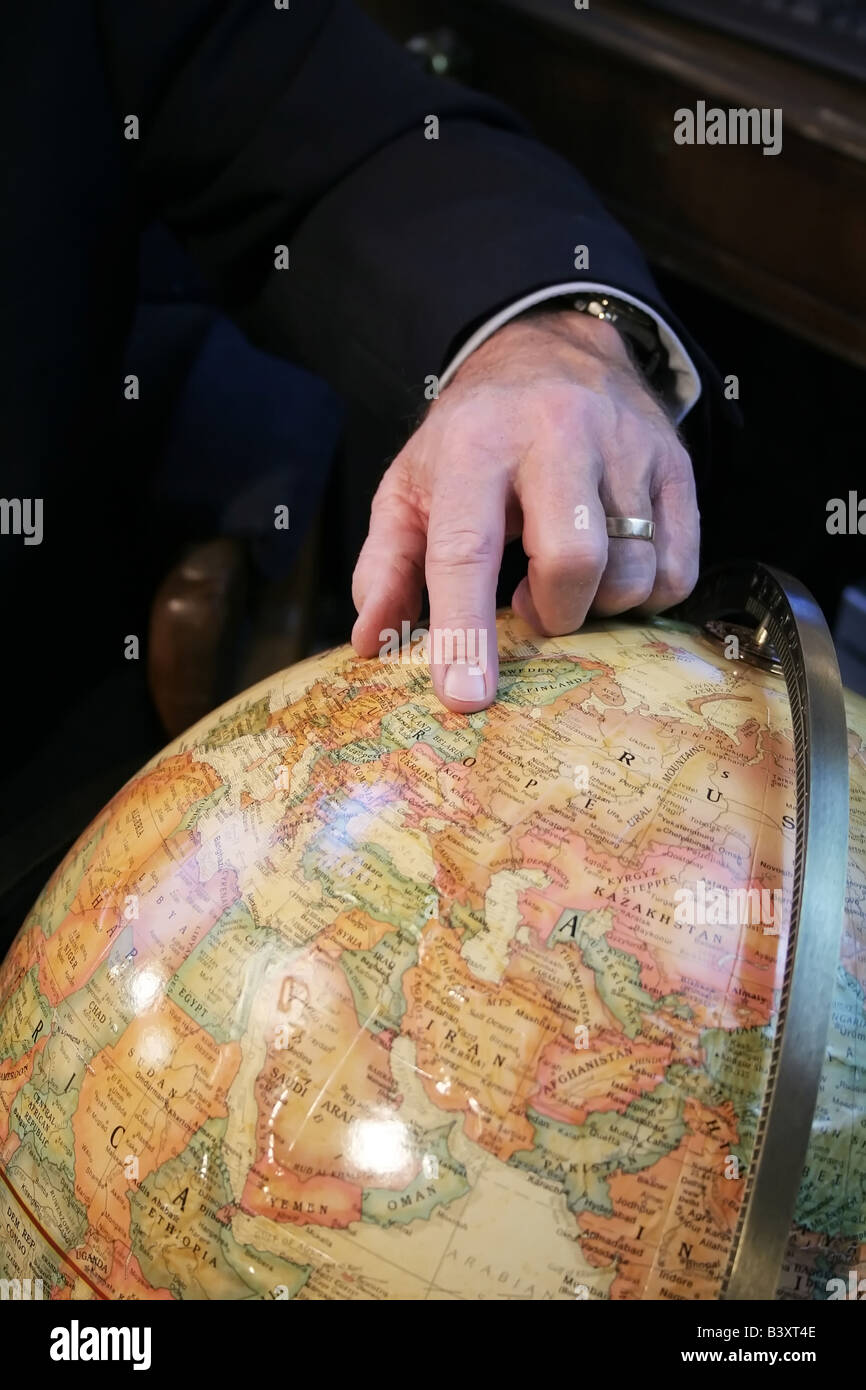 Pointing at globe europe hi-res stock photography and images - Alamy