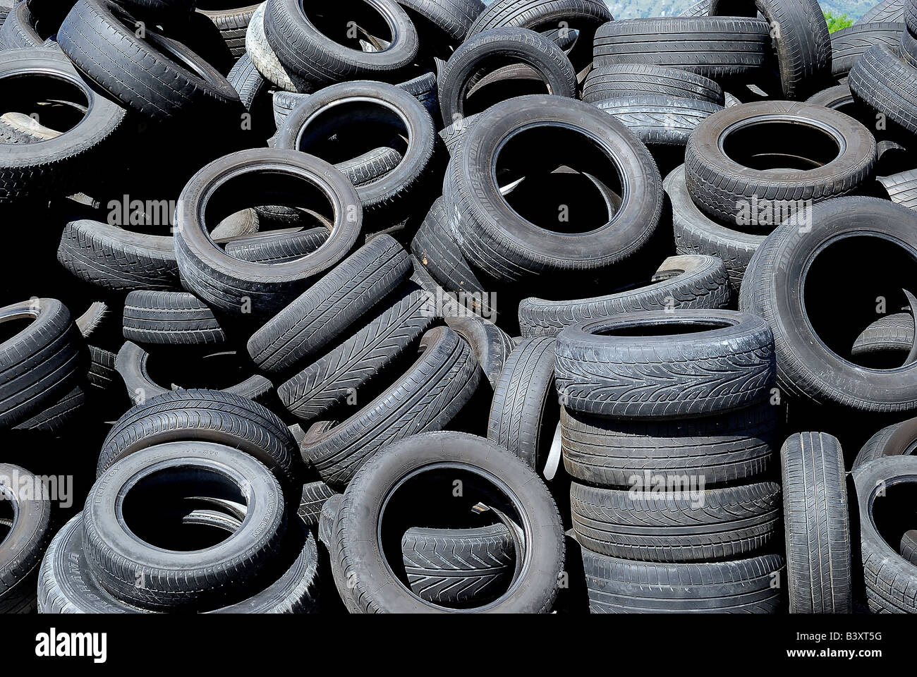 A big heap of used tyres Stock Photo - Alamy