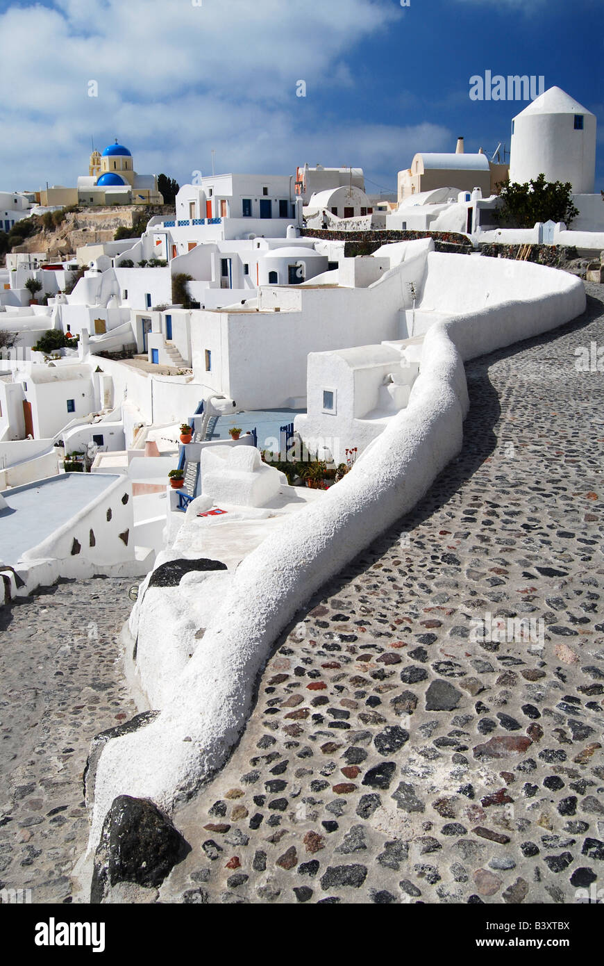 Steep path down island resort town of Oia Santorini Greece Stock Photo ...