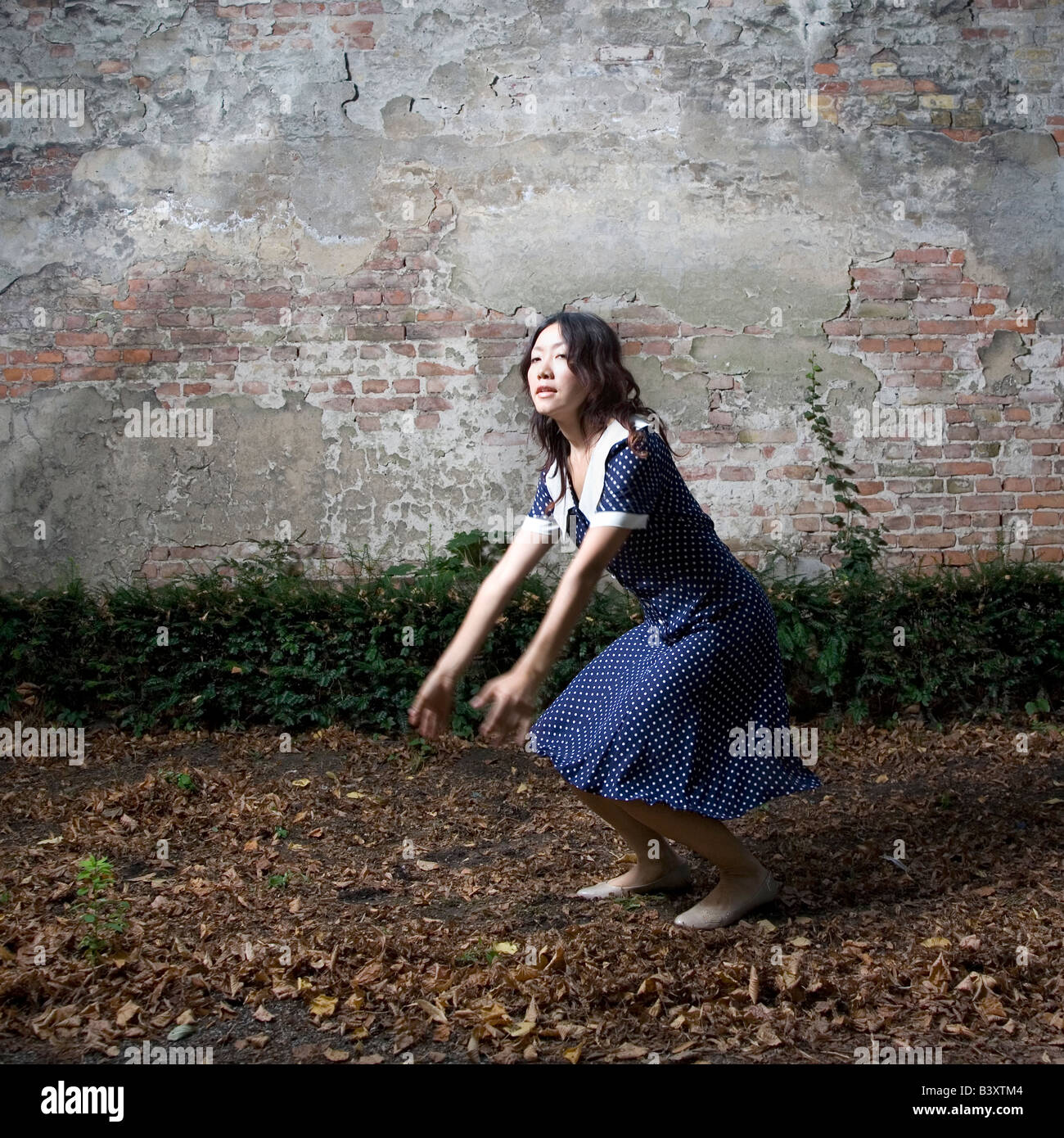 Japanese woman doing a weird dance Stock Photo - Alamy