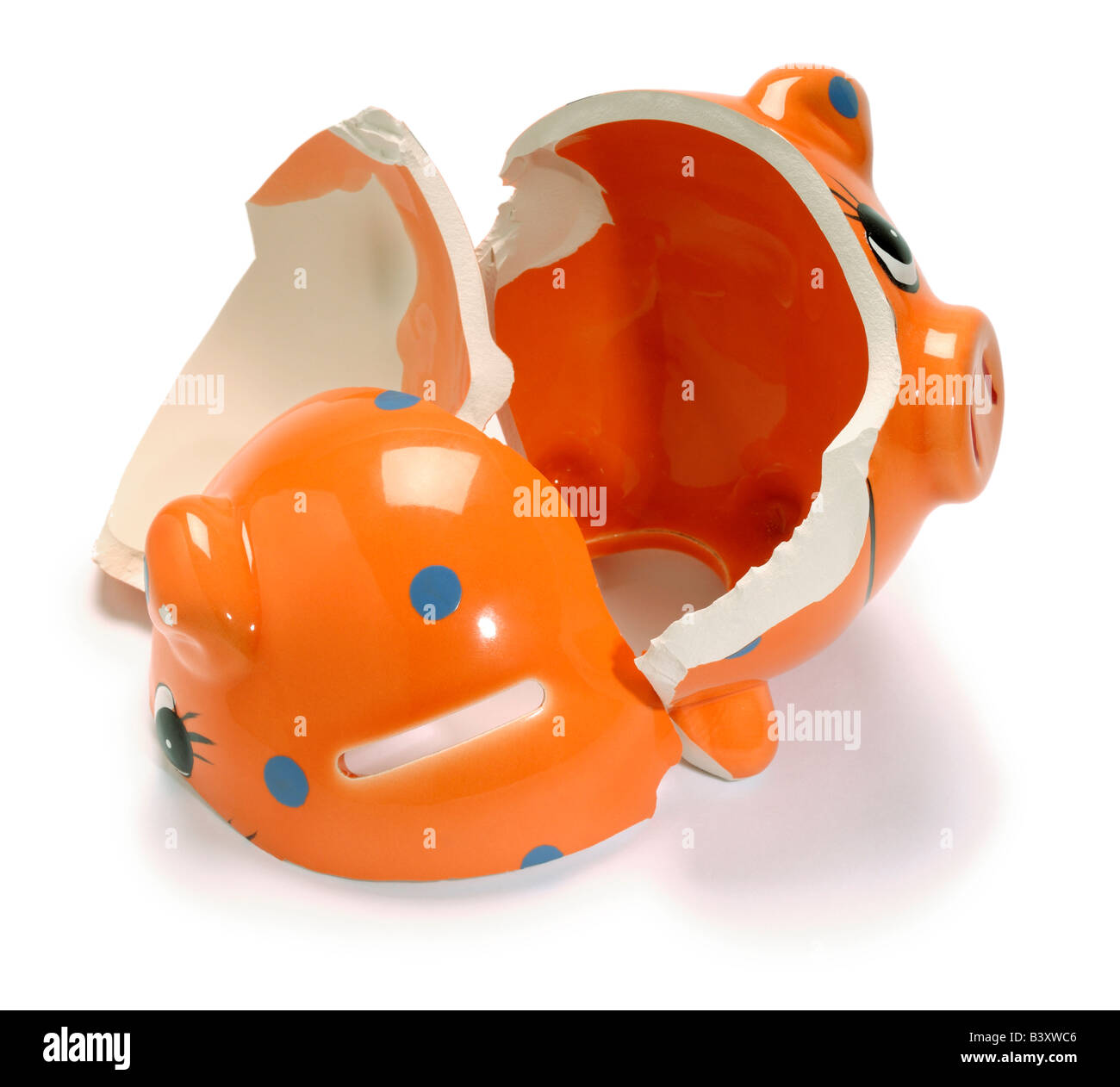 Broken smashed piggy bank Stock Photo - Alamy