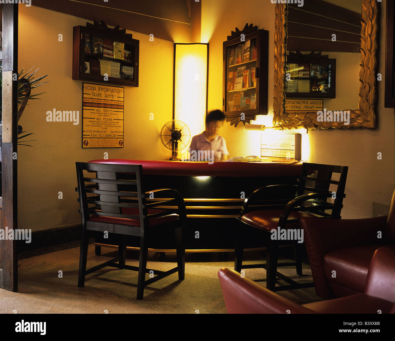 Travel agent at Atlanta Hotel in Bangkok Stock Photo - Alamy