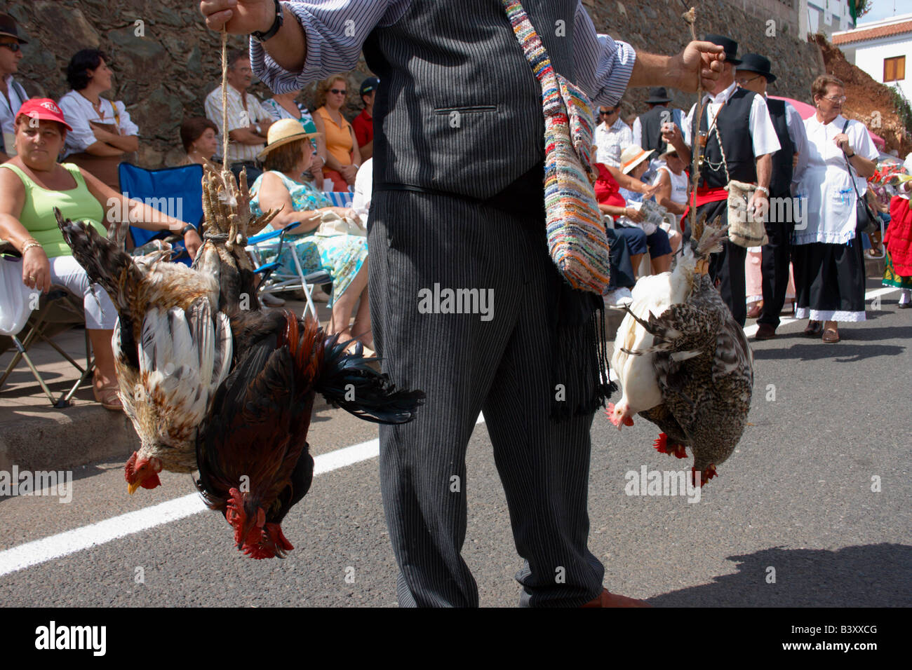 Man carrying chickens hi-res stock photography and images - Alamy
