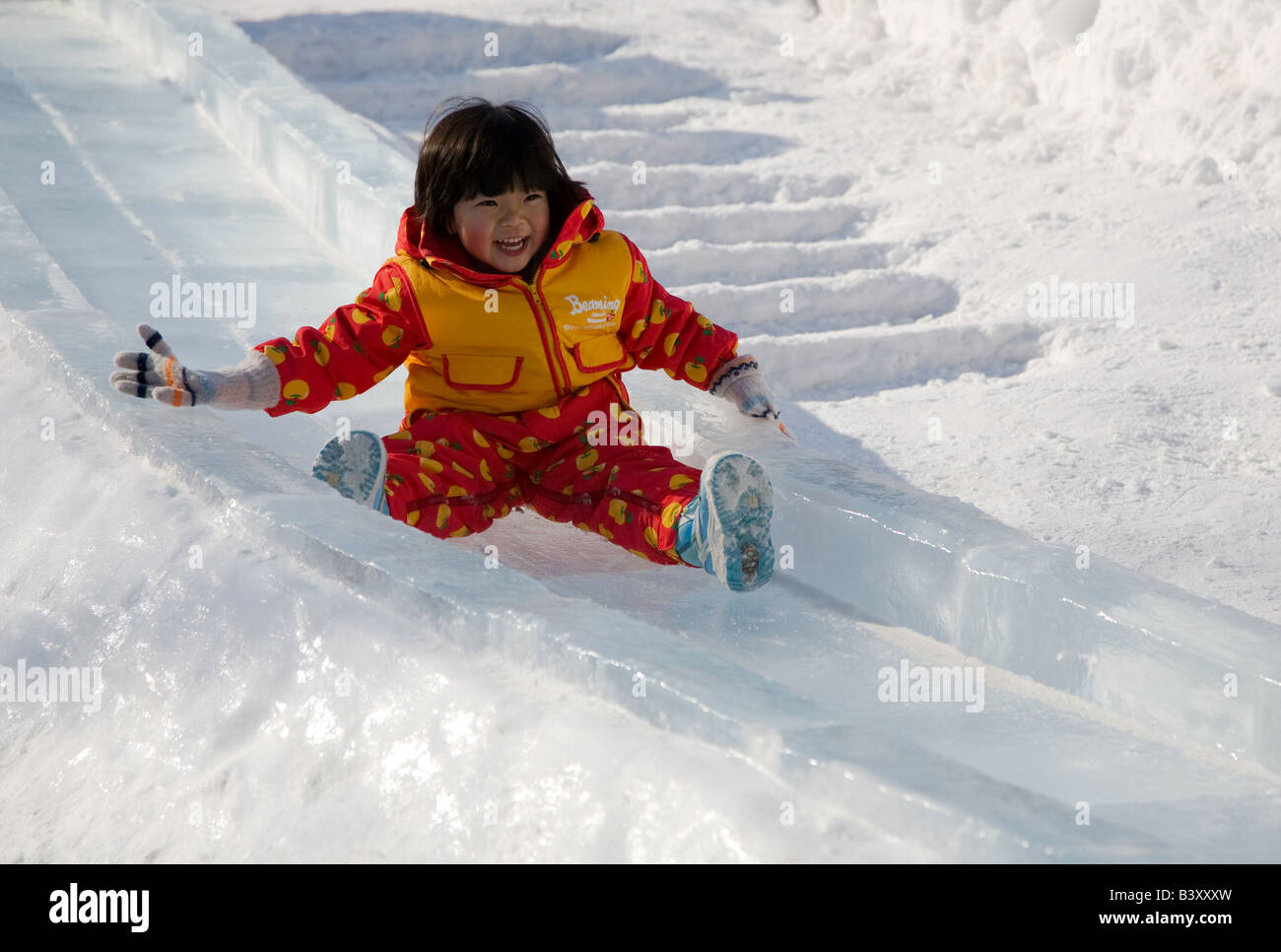 Sapporo Japan Sapporo Snow Festival Odori Park toddler enjoys a ride on ...
