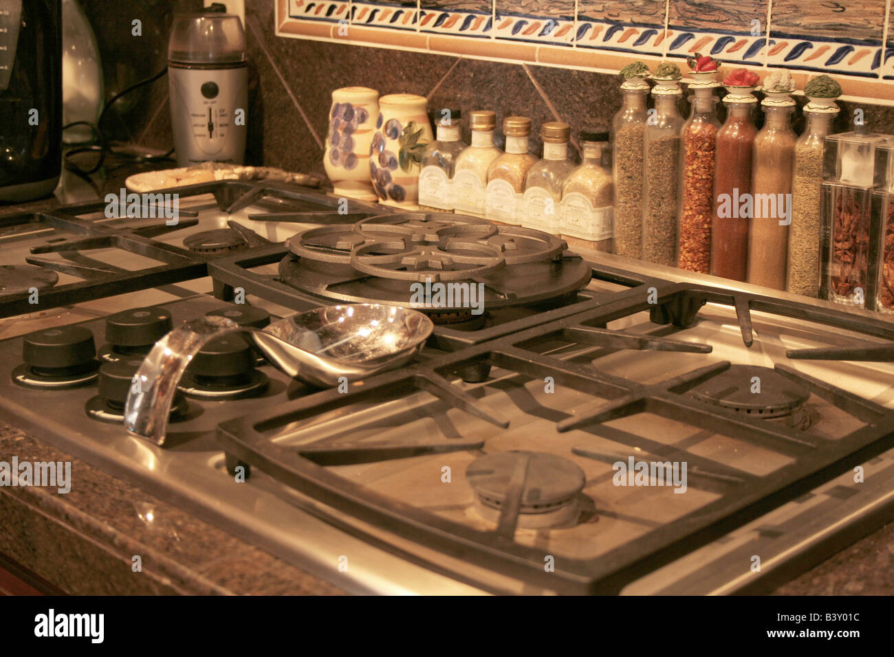 Kitchen stove with tile backdrop Stock Photo - Alamy