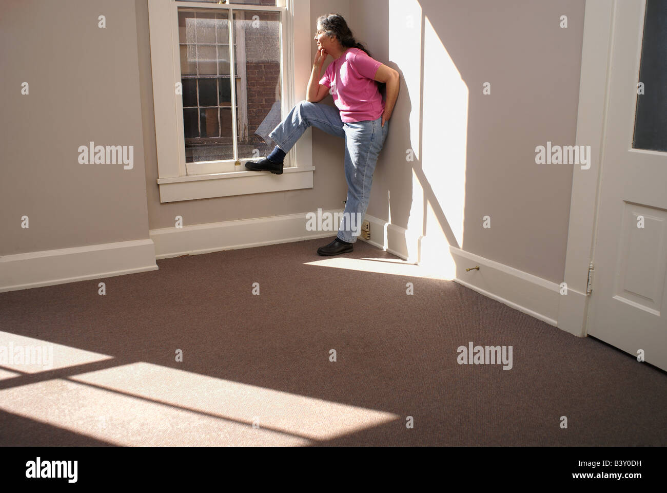Alone in an Empty Room Stock Photo - Alamy