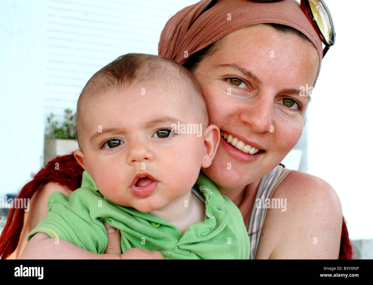 Mum cuddling boy hi-res stock photography and images - Alamy