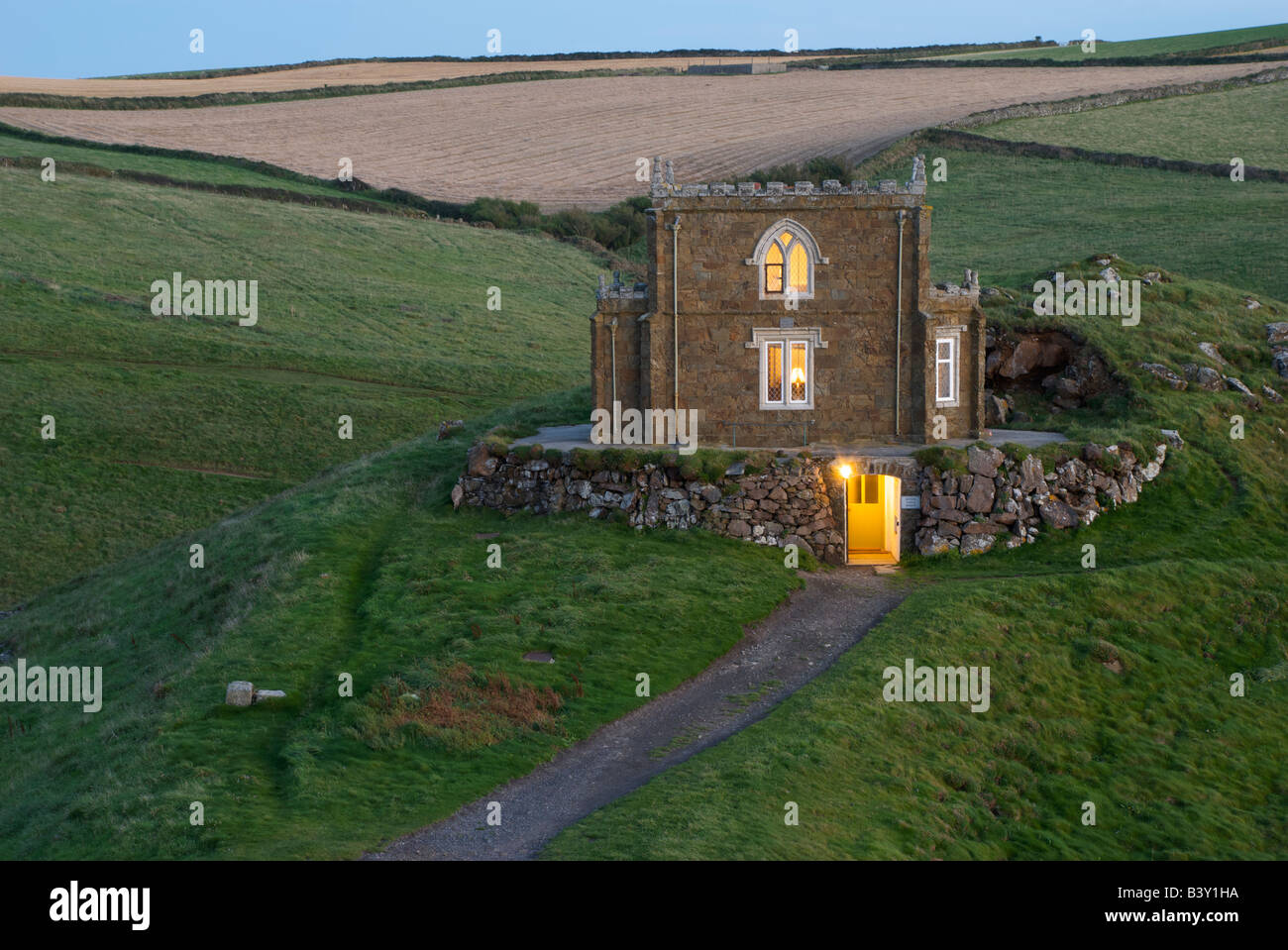 Doyden Castle at dusk, National Trust Stock Photo - Alamy