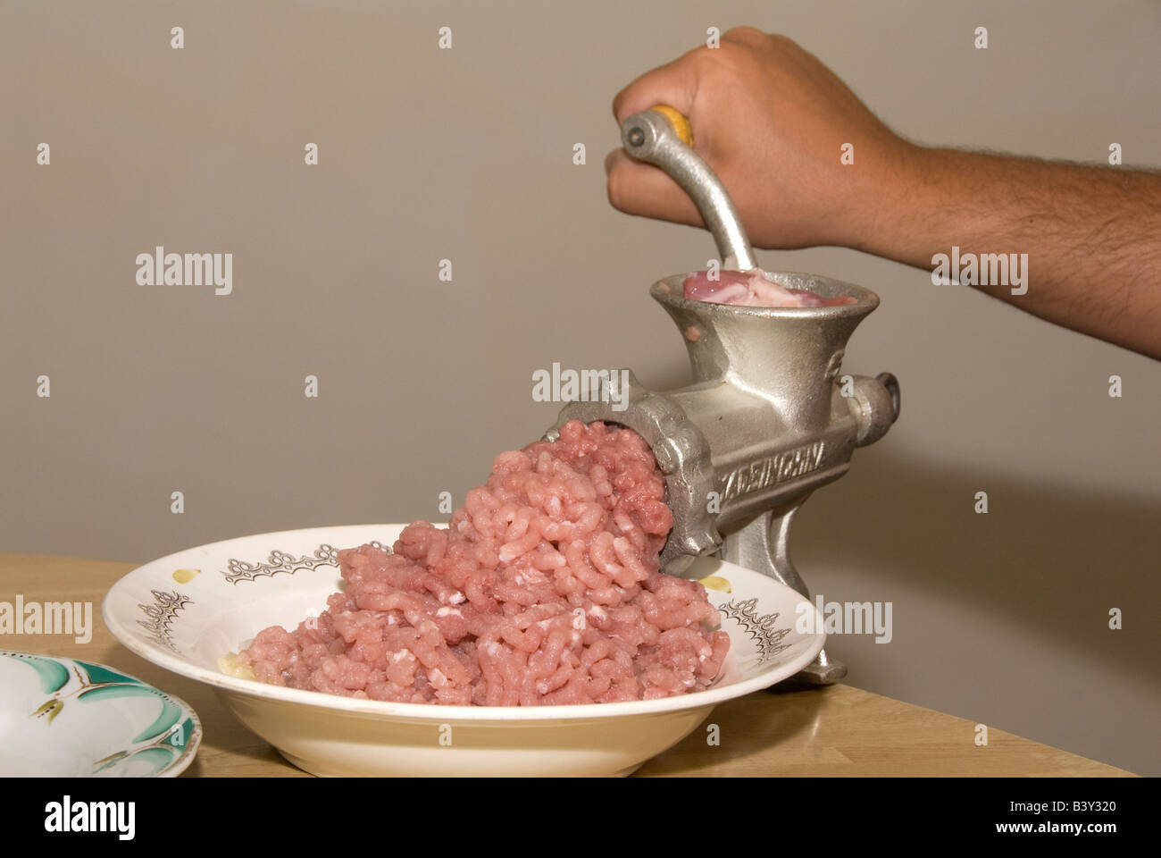 Meat mincer hi-res stock photography and images - Alamy