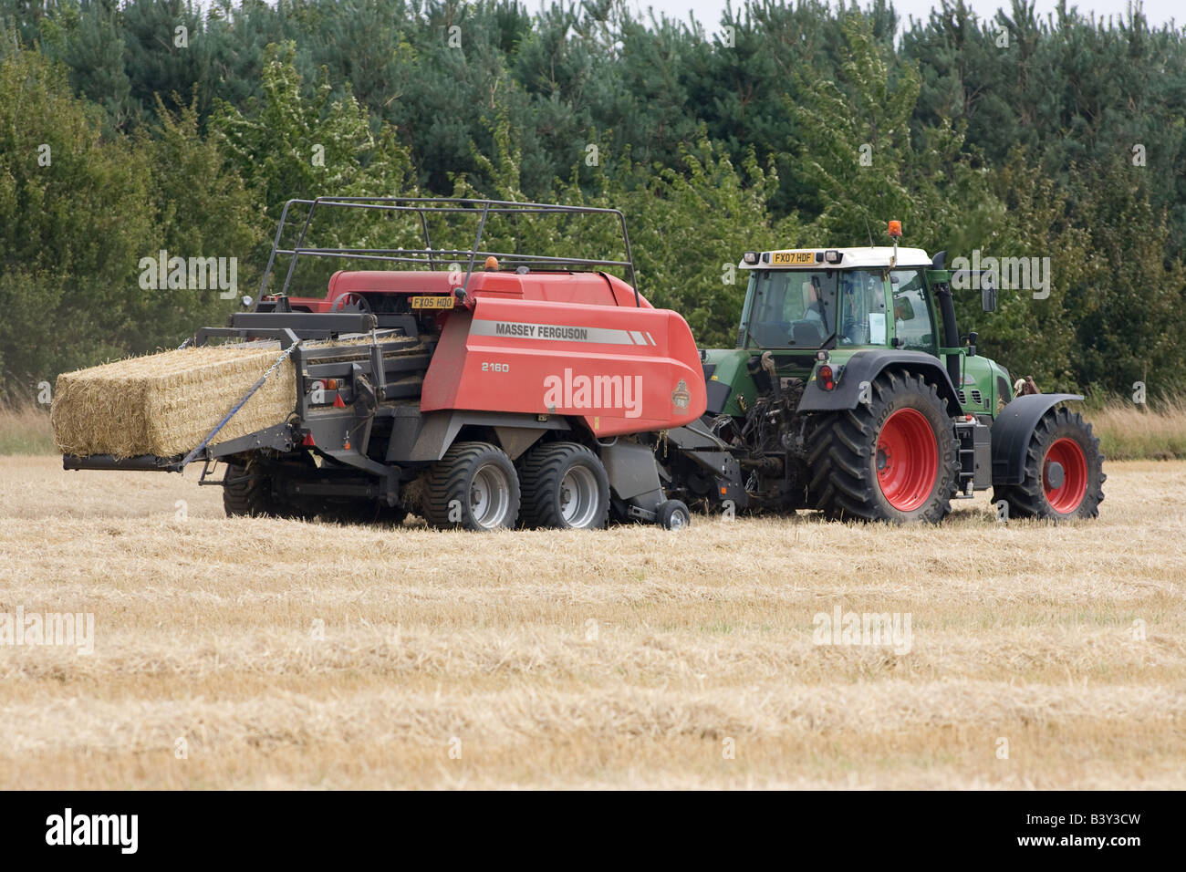 Fendt Tractor Baling With Massey Ferguson Baler Stock Photo - Alamy