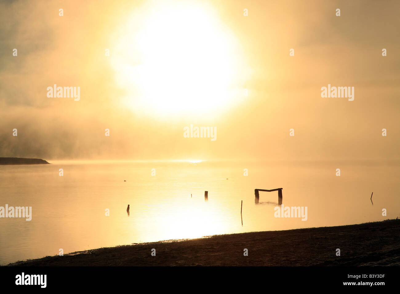 Sun rising up over sea hi-res stock photography and images - Alamy