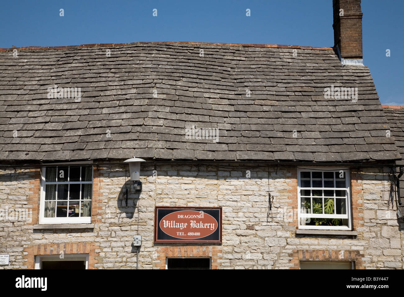 Dragons the village Bakery in Corfe Castle Village Dorset England Stock ...
