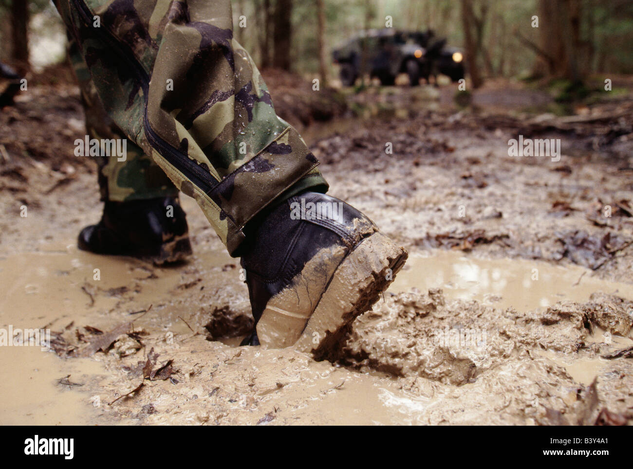 Close up of boot in mud of a USA Army soldier on maneuvers in the field Stock Photo - Alamy
