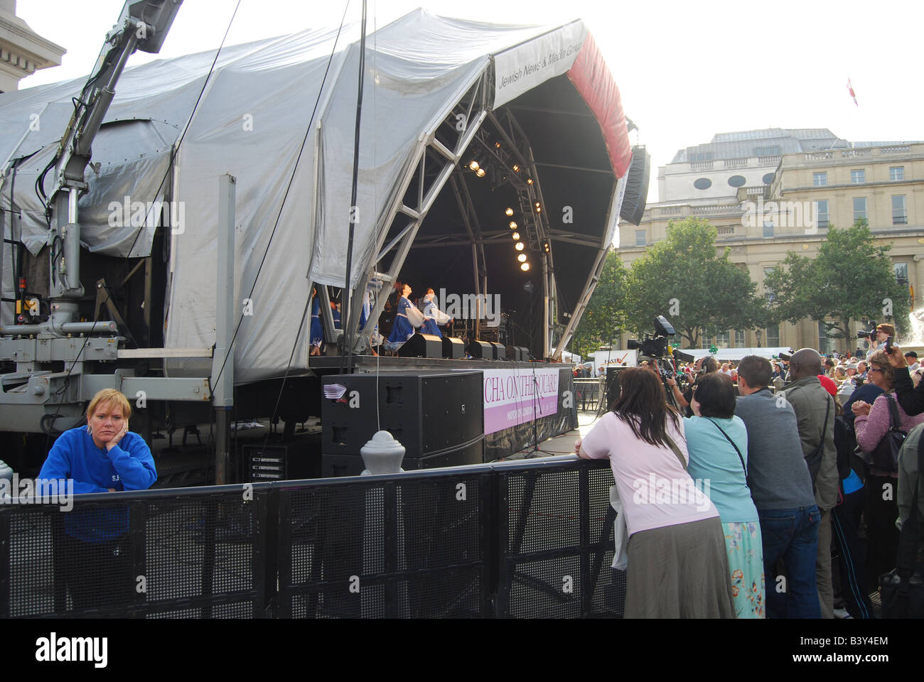 Bored woman Concert Trafalgar square Stock Photo - Alamy
