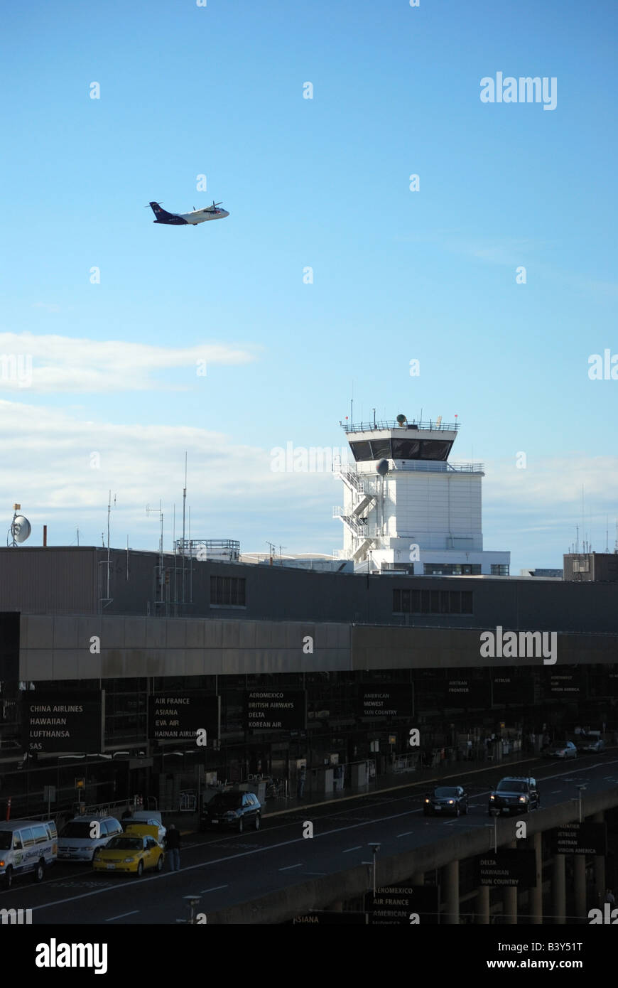 A plane takes off from Seattle-Tacoma International Airport Stock Photo ...