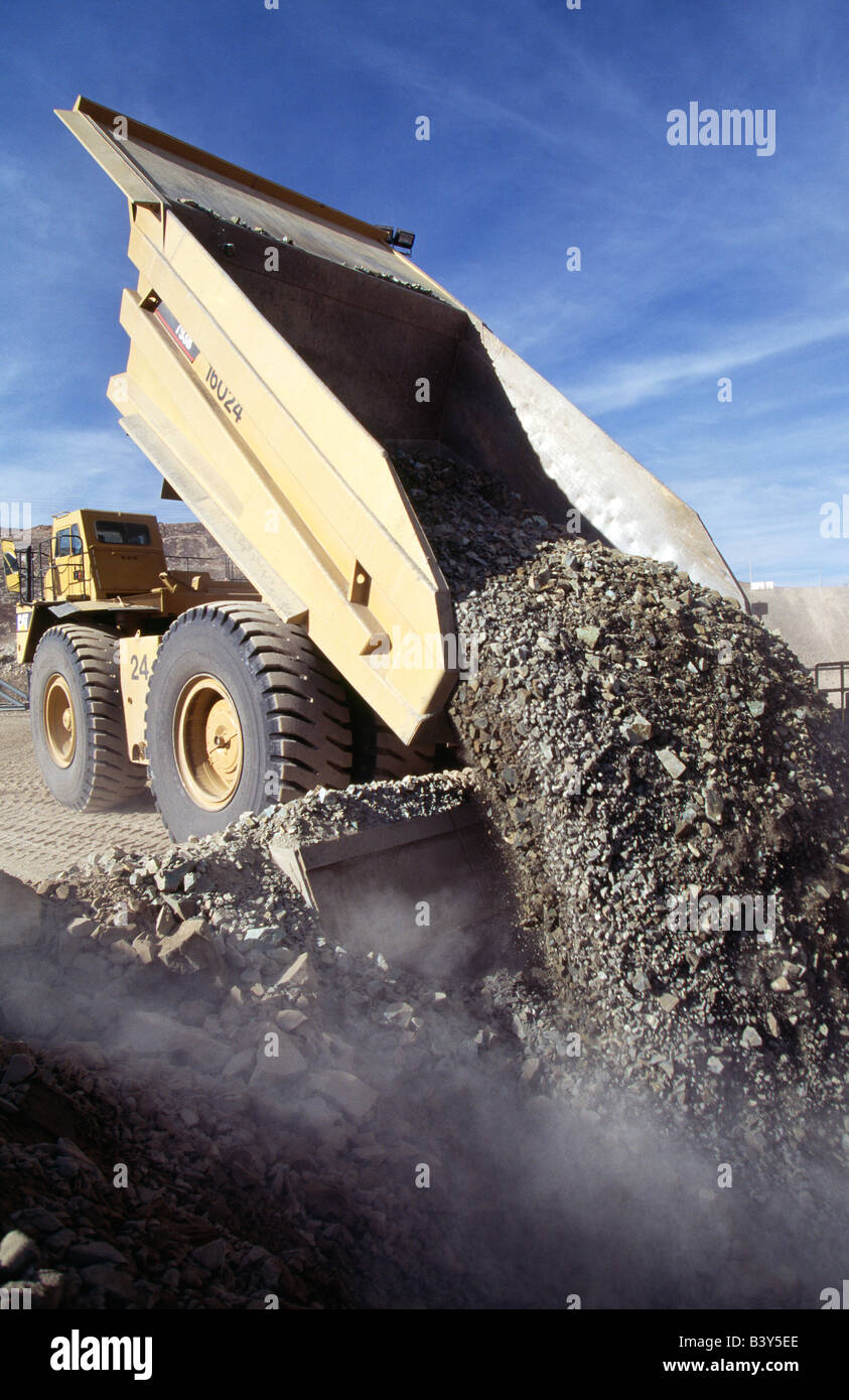 Truck dumps load of ore at El Abra Copper Mine, Calama, (northern ...