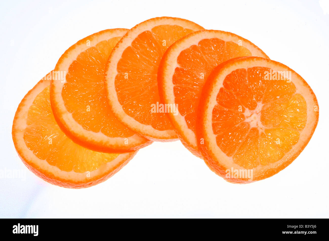 Five orange slices fanned out ontop of one another Stock Photo - Alamy