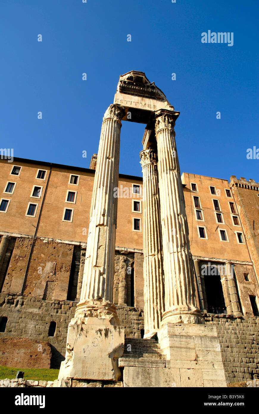 The remains of the Temple of Saturn in the Romun Forum in Rome Italy ...