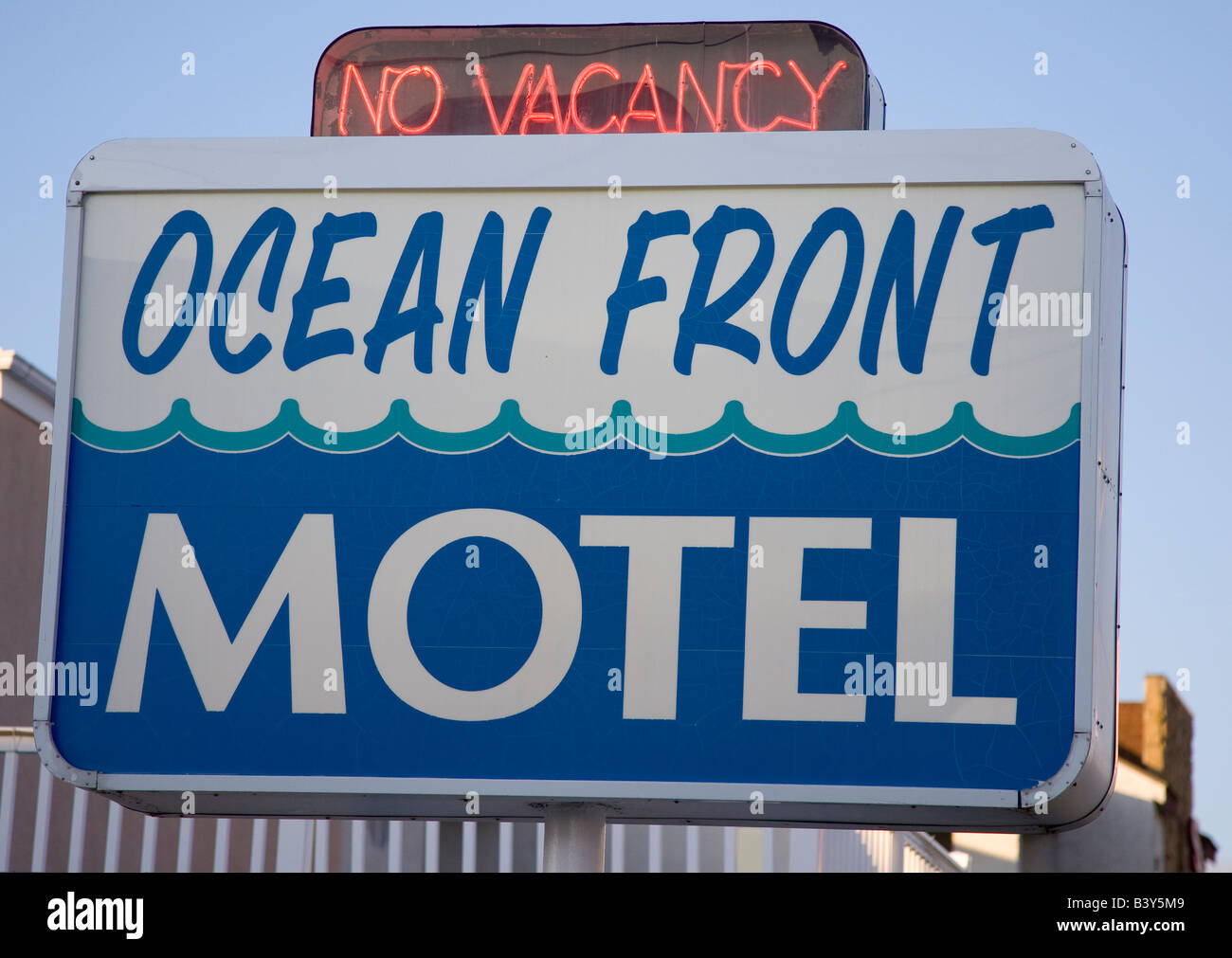 Sign at a motel on the beach Stock Photo - Alamy