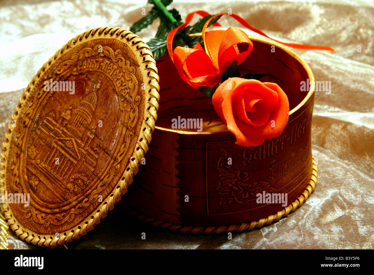 Rose shaped marcipan.and a circle cyrillik alphabet signed box from St ...