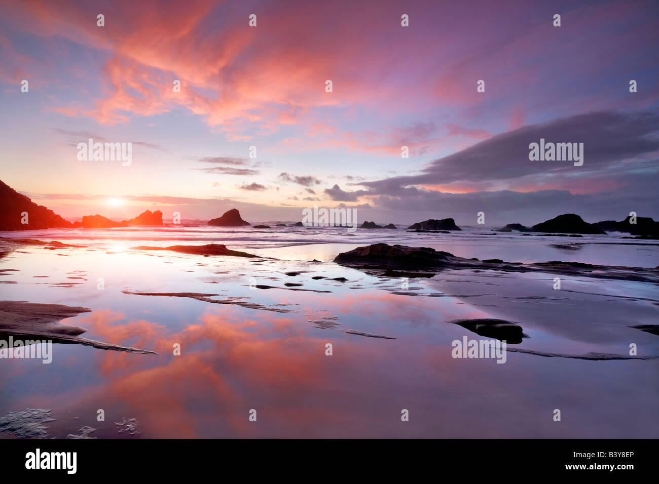 Sunset and reflection at Seal Rock Oregon Stock Photo - Alamy