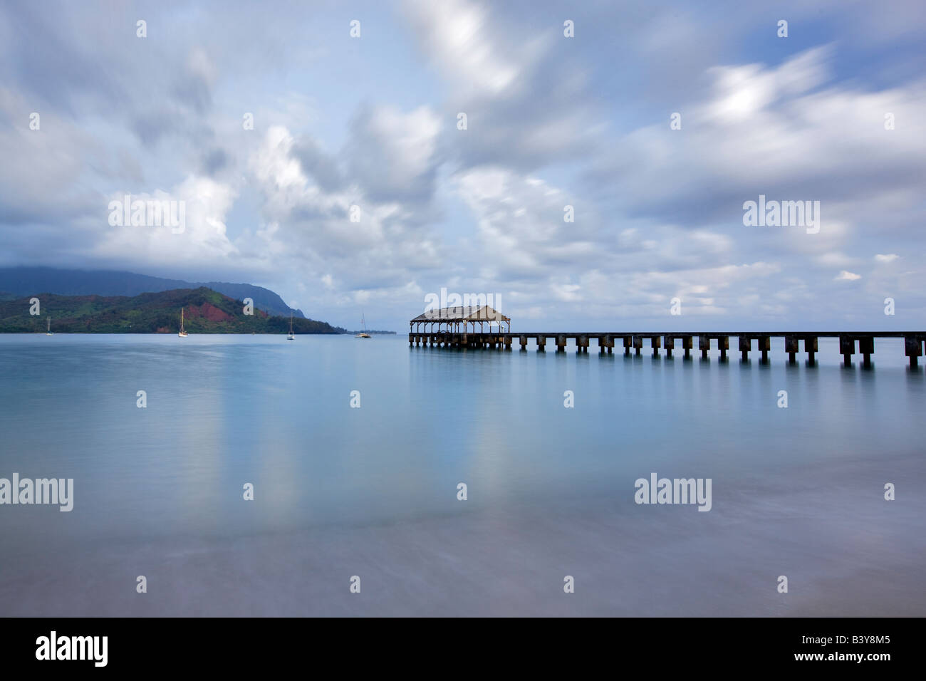Sunrise with pier at Hanalei Bay Kauai Hawaii Stock Photo - Alamy