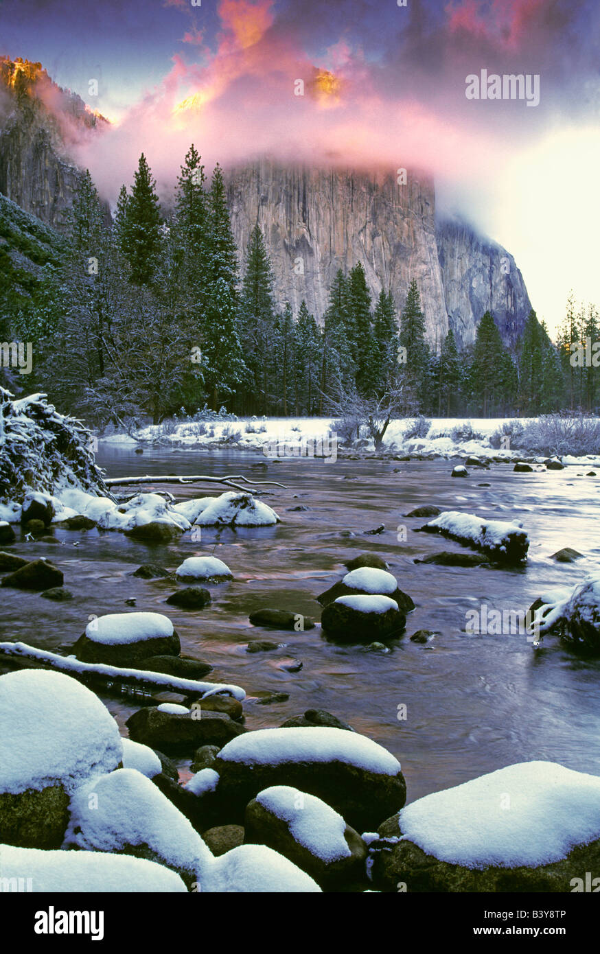 USA, California, Yosemite National Park. Sunlight on clouds over El ...