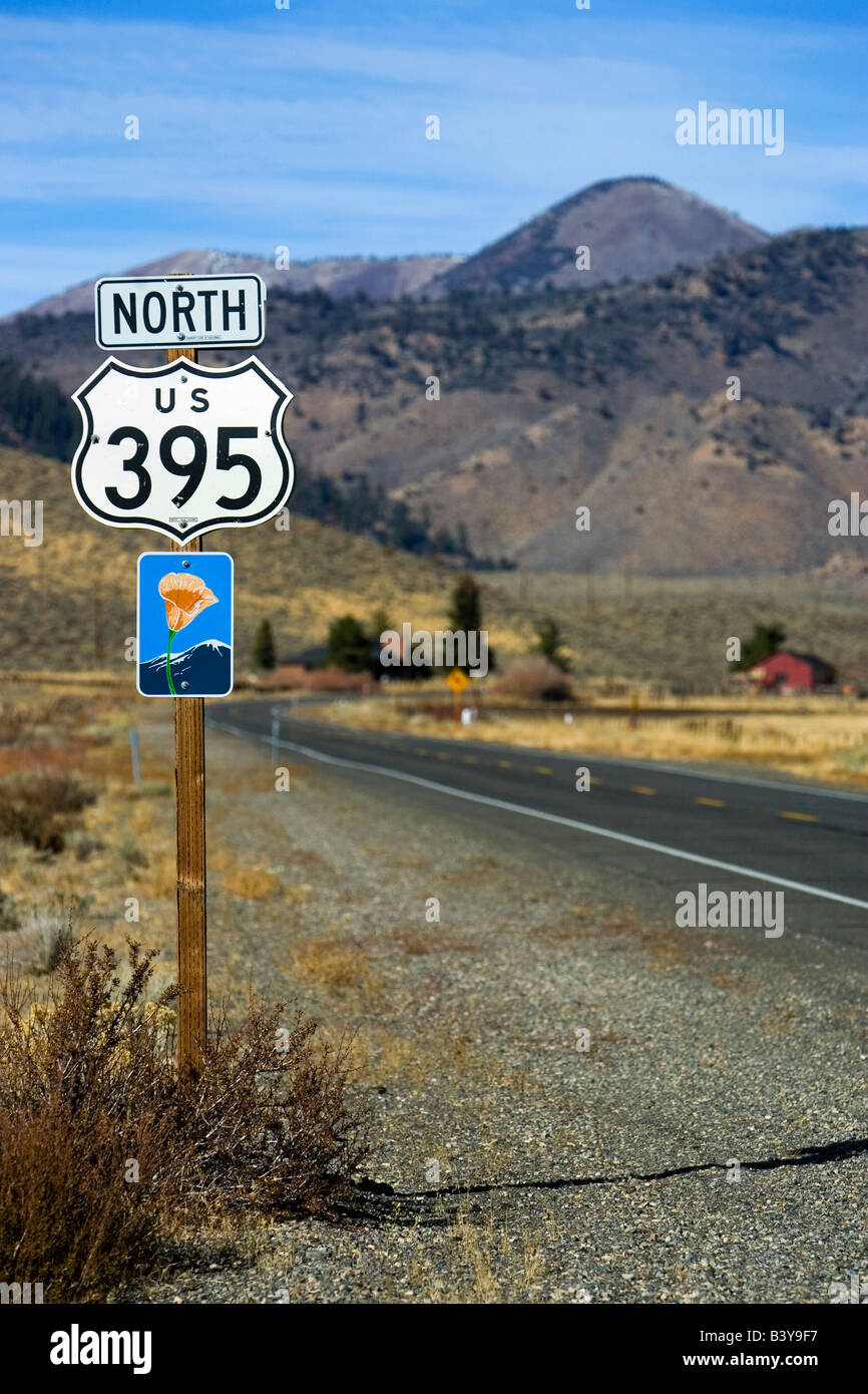 An upward view of a Highway 395 North sign post including a California ...