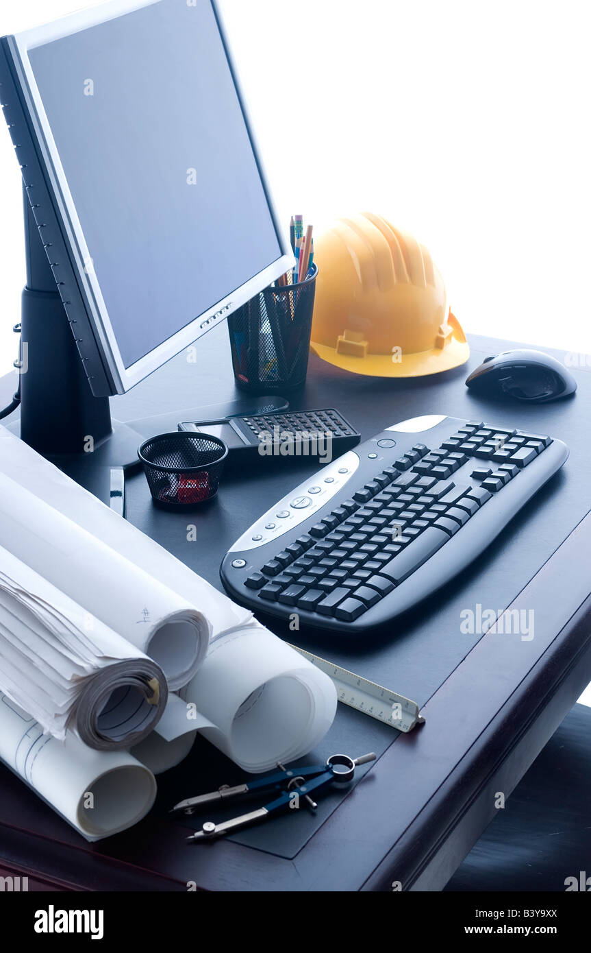 A professional desktop of an Engineer with drawings computer W B ...