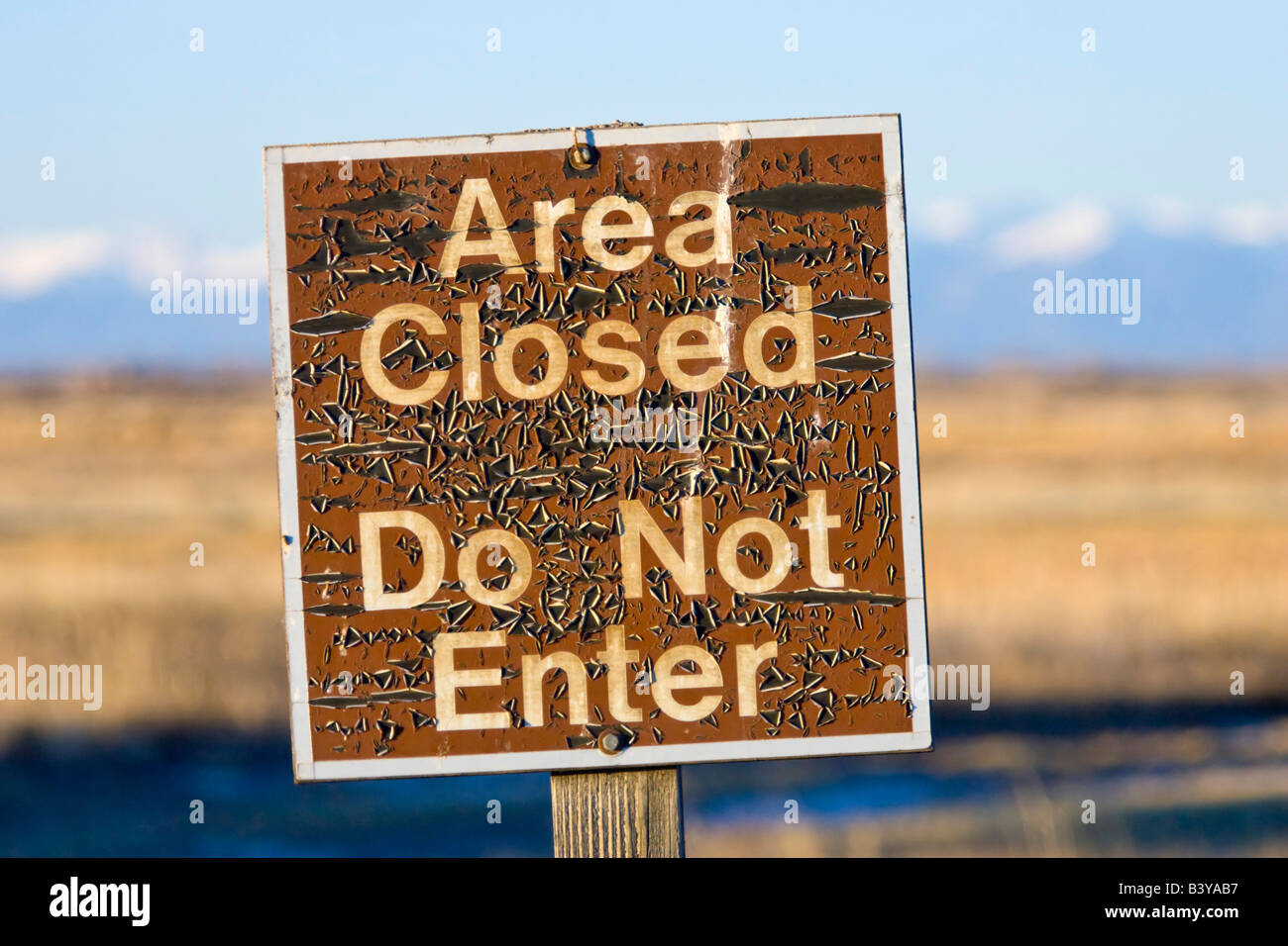 USA, Colorado. An aged warning sign in the Monte Vista National ...