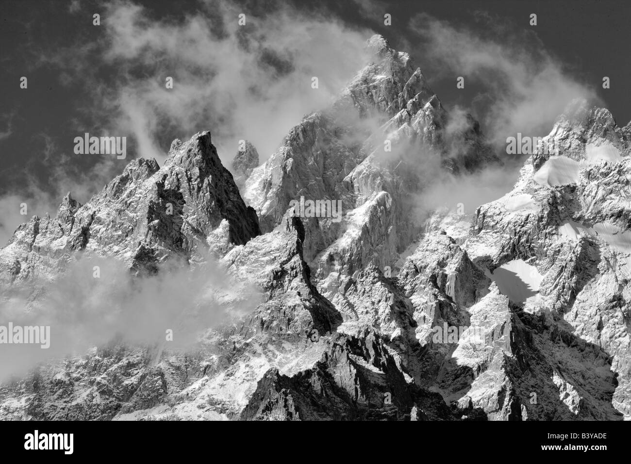 Peak of Teton Mountains with snow and clouds Grand Teton National Park ...