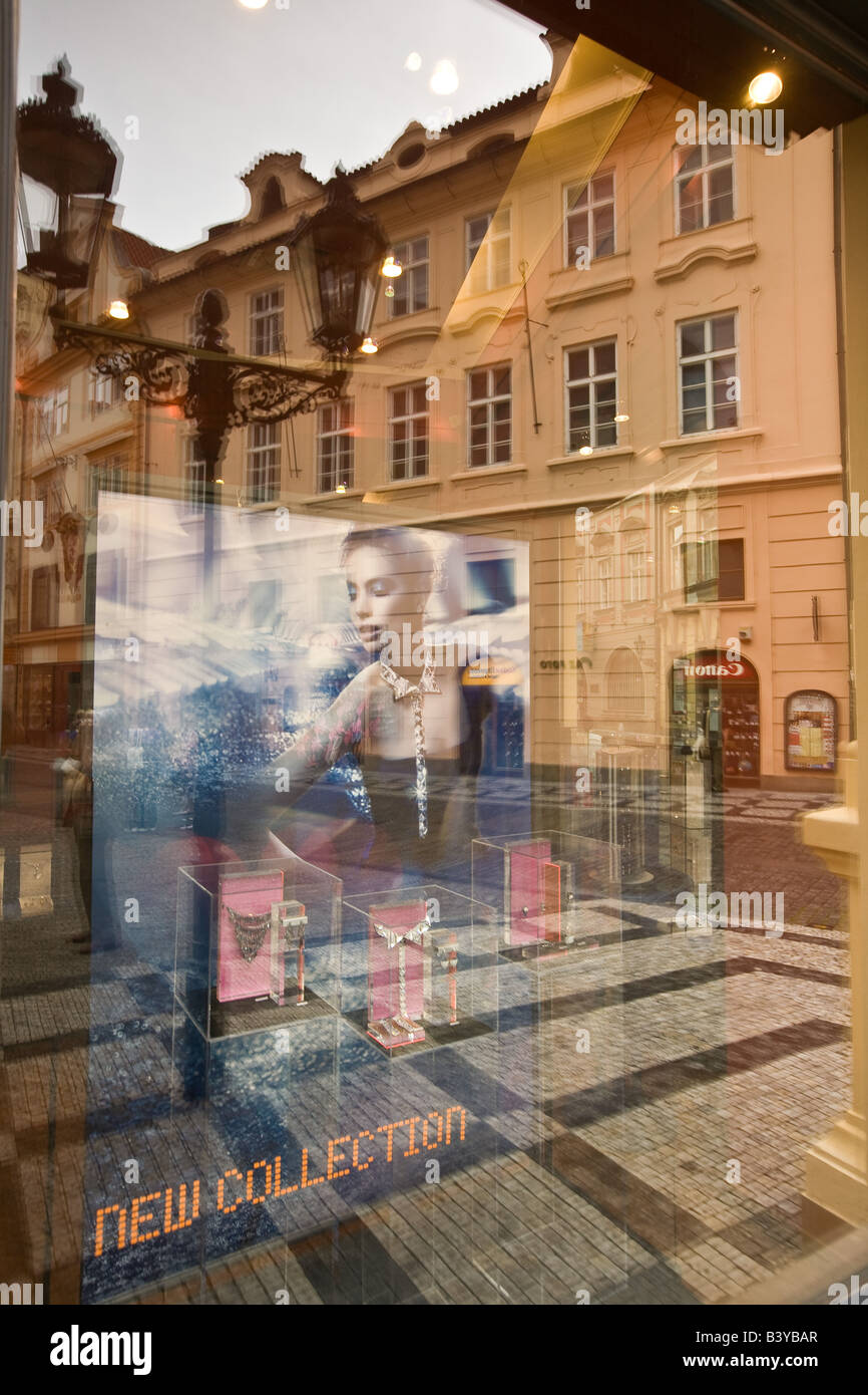 Reflections of house fronts in a jewellery store window in the Old Town ...