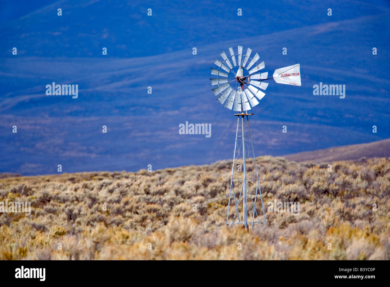 Windmill in isolated area near Red Mountain Pass Montana Stock Photo ...