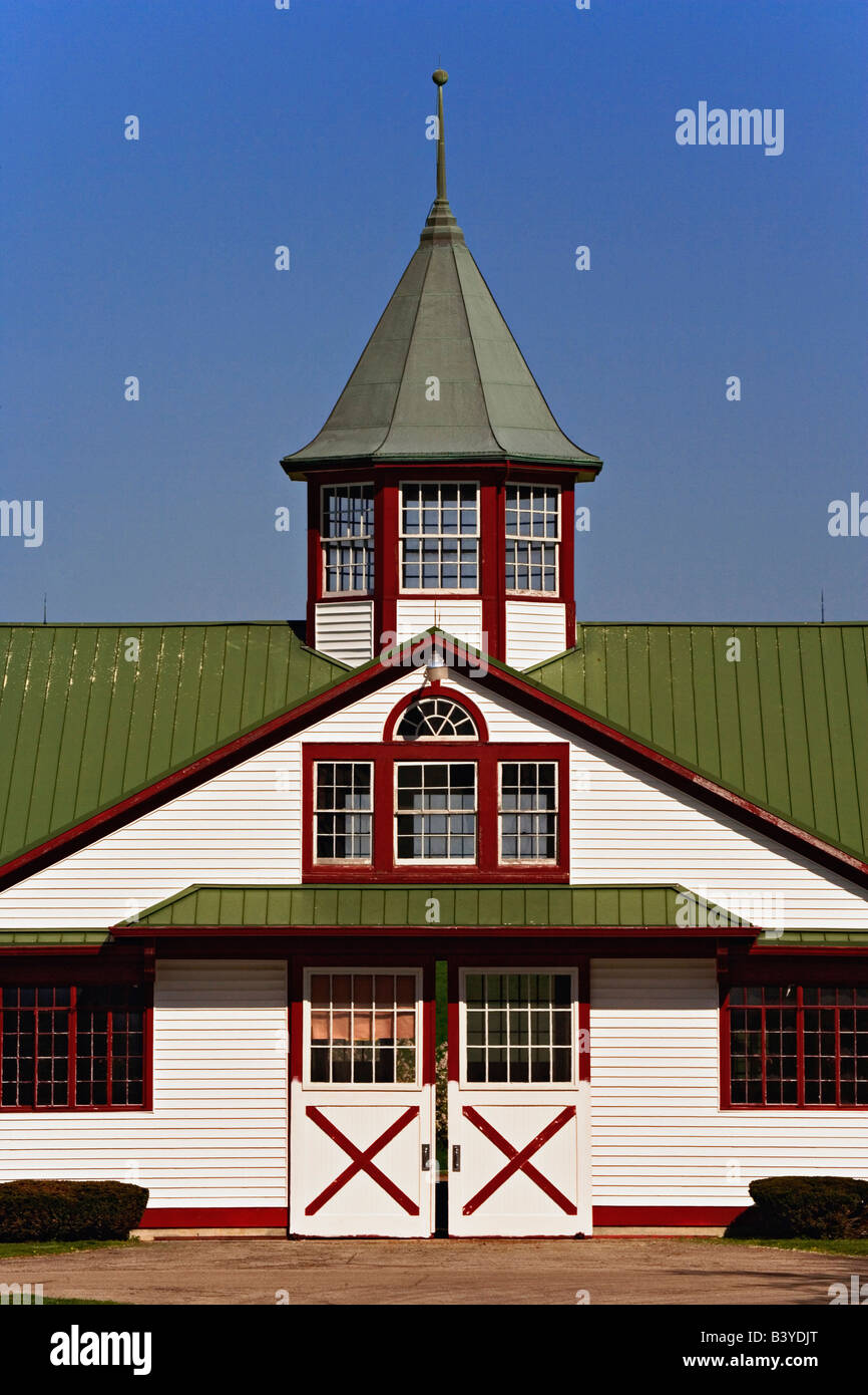 Distinctive red, white, and green colors of horse barn, Calumet Farm ...