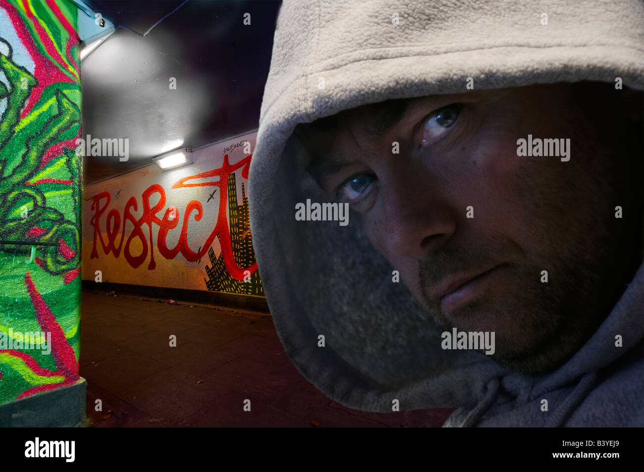 Portrait of man in hoody looking sinister deliberately dark Stock Photo ...