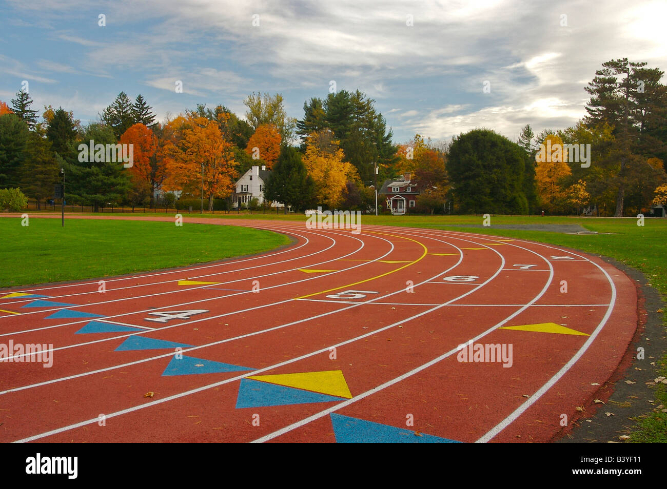 North America, USA, Massachusetts, Amherst. Autumn view of a running ...
