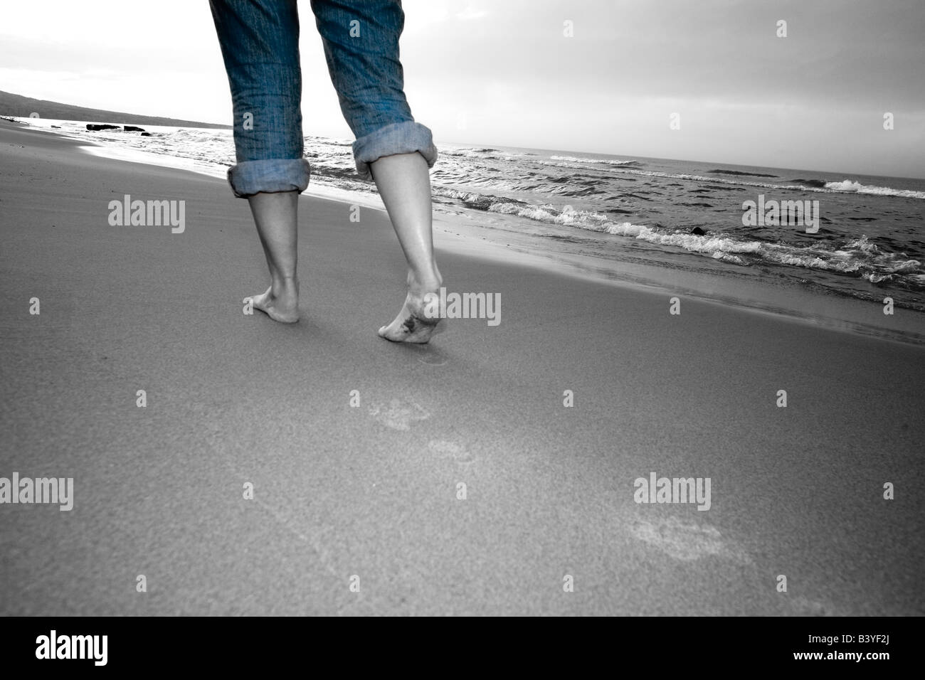 Walking along the Lake Superior shoreline near Silver City Michigan at ...