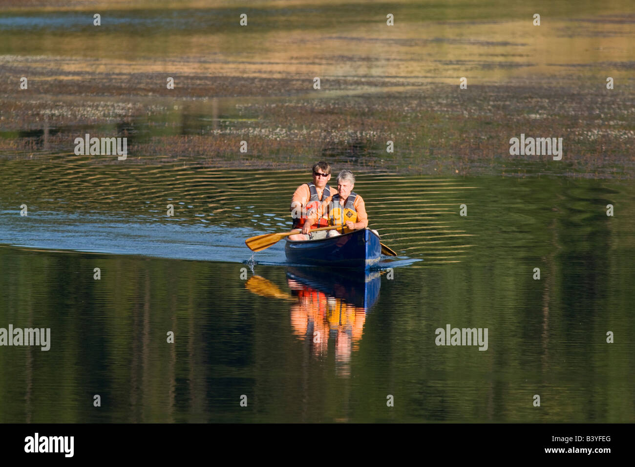 Mother and son canoeing on Upper Stillwater Lake in Montana model ...