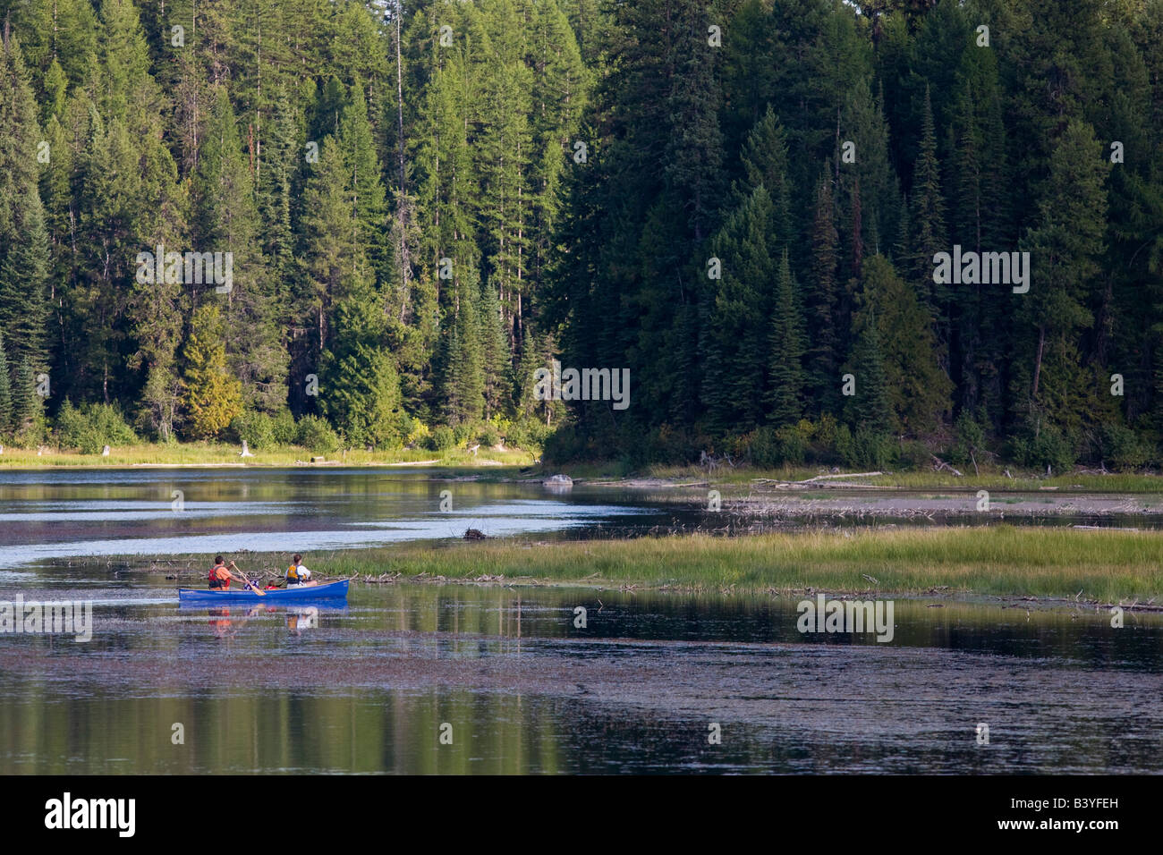 Mother and son canoeing on Upper Stillwater Lake in Montana model ...