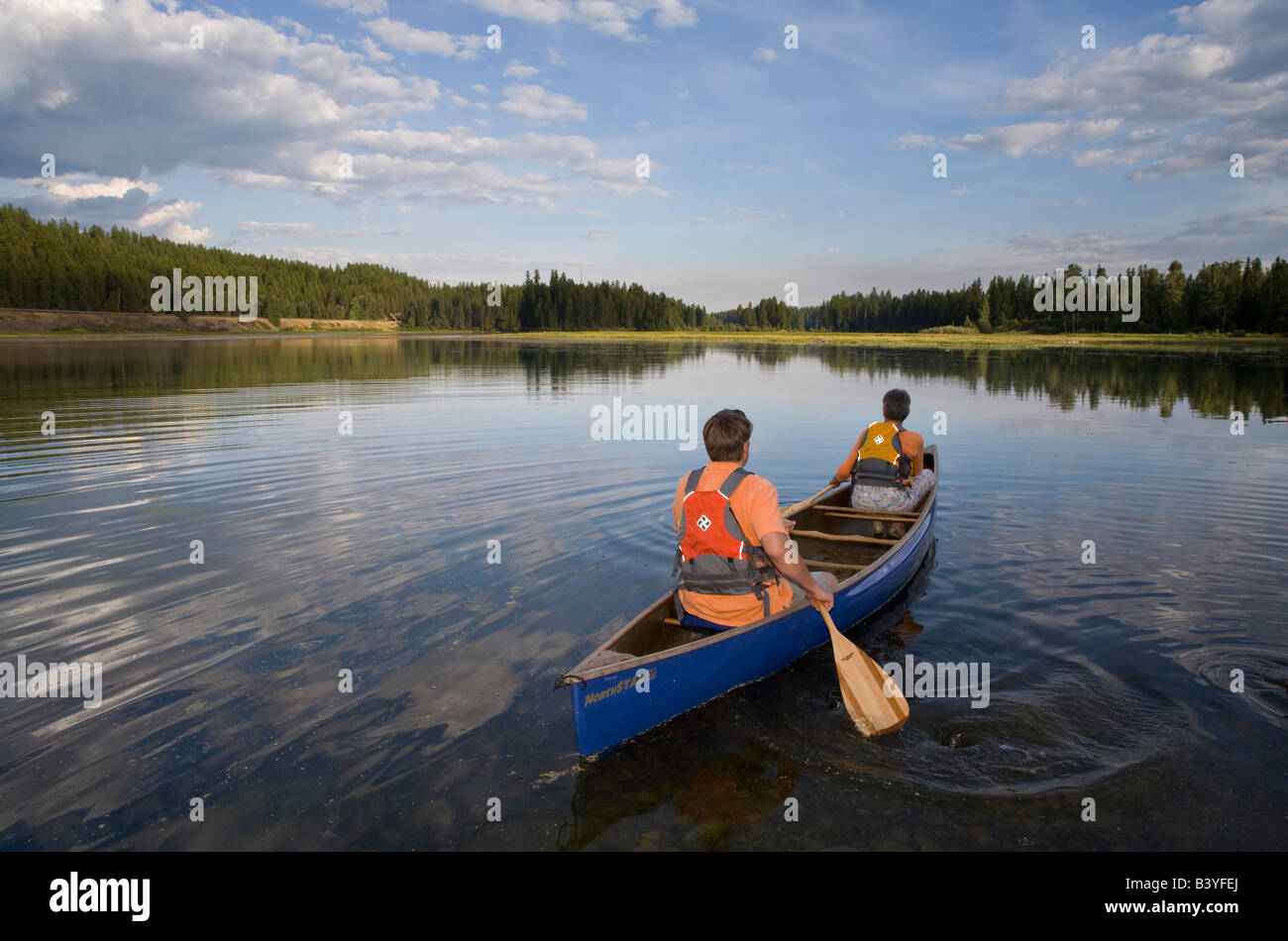 Mother and son canoeing on Upper Stillwater Lake in Montana model ...