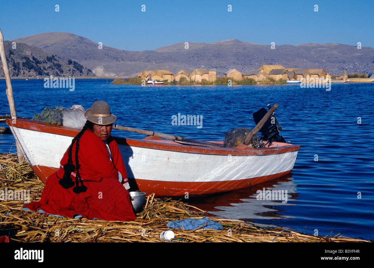 Peru, Puno, An Indian woman from the Uros or floating reed islands of ...