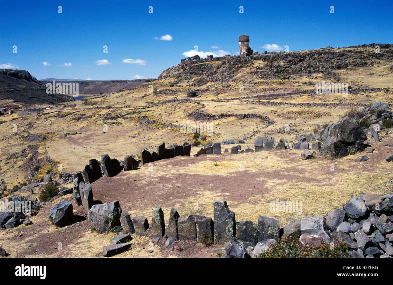 Peru, Puno, Sillustani. Chullpa (Inca burial chamber) and stone circle ...