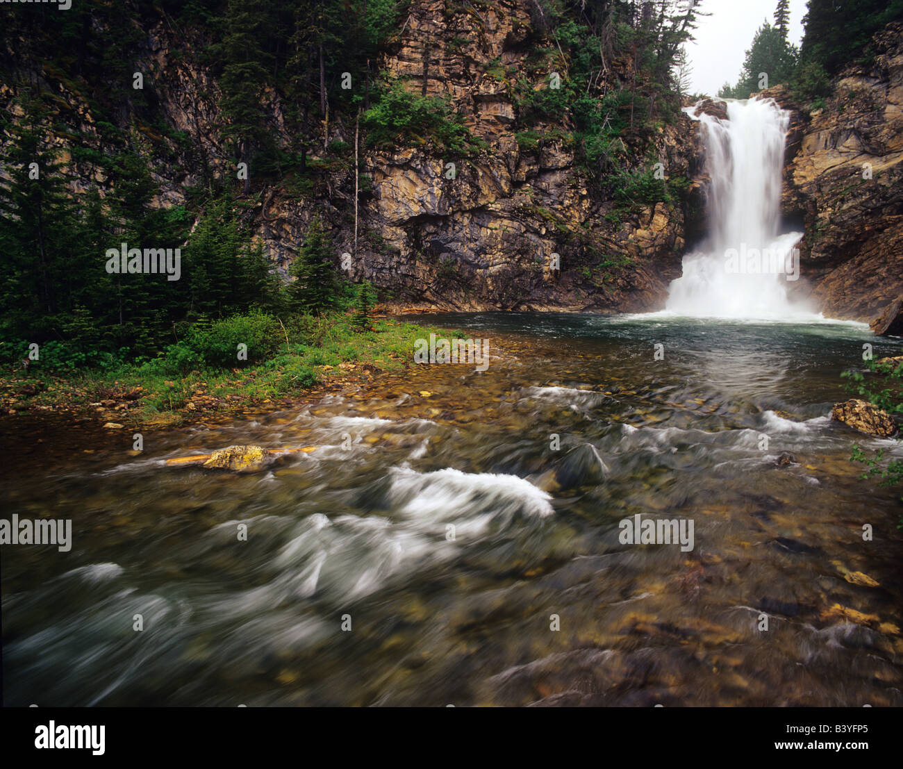 Running Eagle Falls aka Trick Falls in the Two Medicine Valley of ...