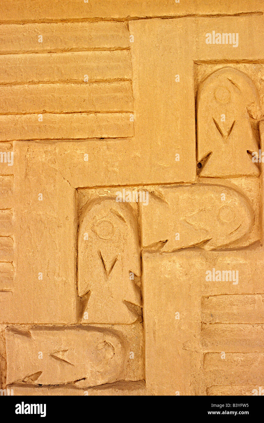 Peru, Trujillo, Chan Chan. Adobe wall frieze incorporating a fish and ...