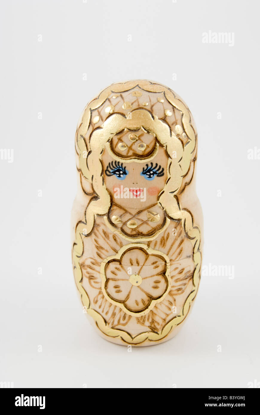 Wooden Russian Babushka Doll on white background Stock Photo - Alamy