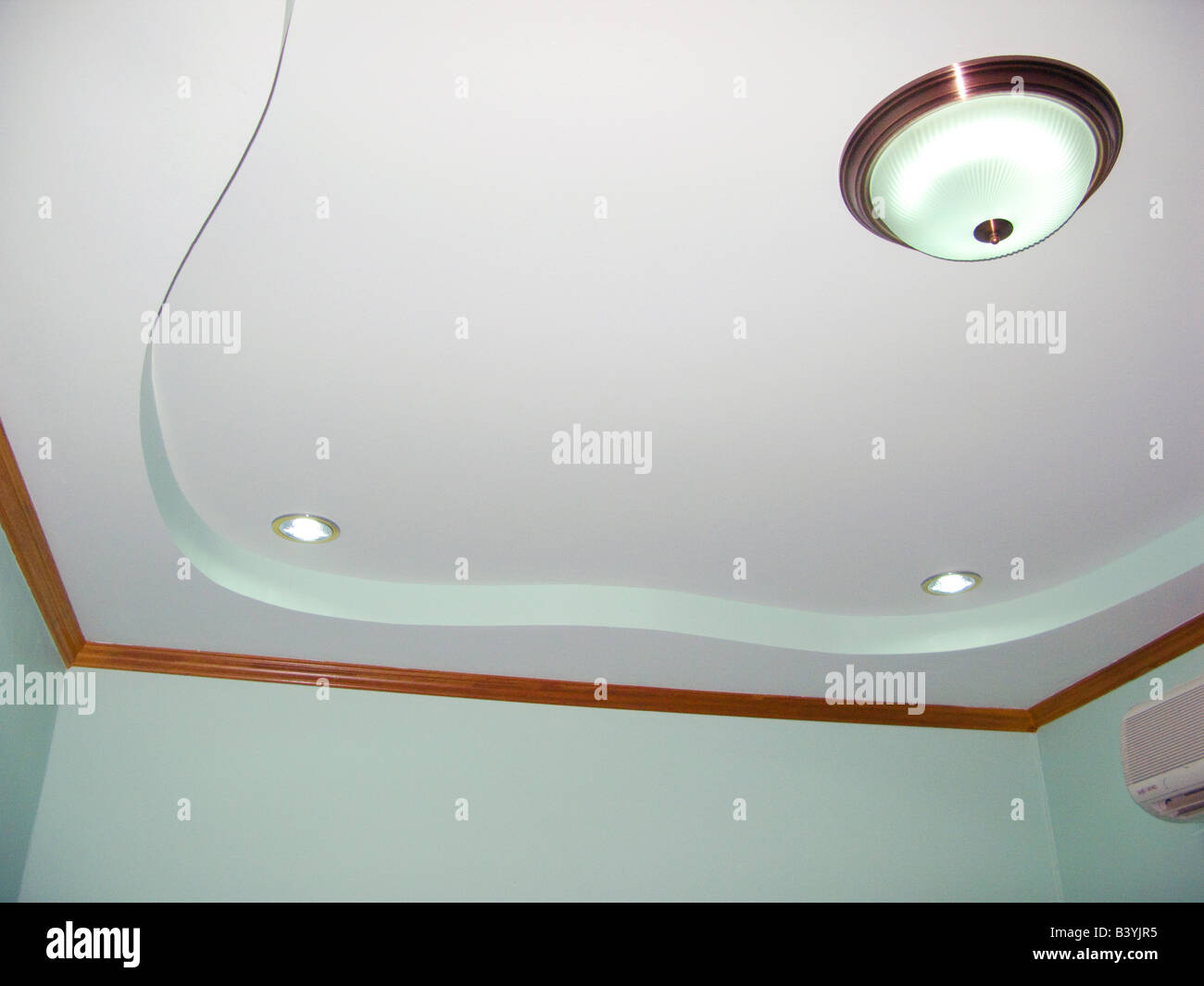 Ceiling of tacky Thai guest house room Stock Photo - Alamy