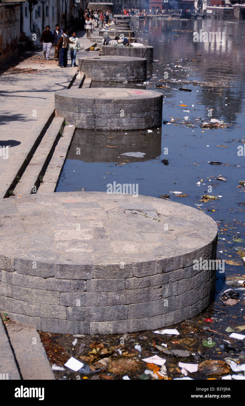Nepal, Kathmandu. Cremation ghats by the Bagmati River at Pashupatinath ...